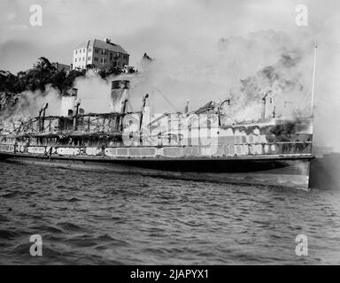 Sydney ferry BELLUBERA burning at Kurraba Point depot ca. 1936 Stock ...