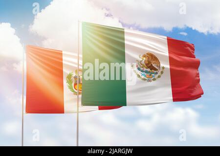 Mexico flag and Peru flag waving together on blue sky, two country ...