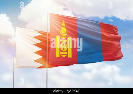 Sunny blue sky and flags of bahrain and kuwait Stock Photo - Alamy