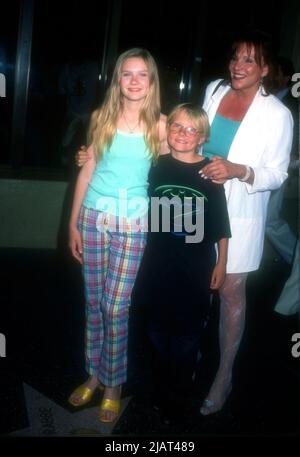 Actress Kirsten Dunst and her brother Christian arrive for the 79th ...