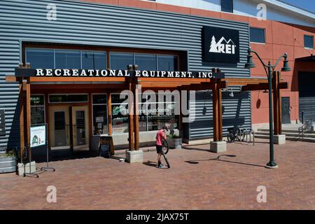 A customer exits an REI (Recreational Equipment, Inc.) store in Santa ...