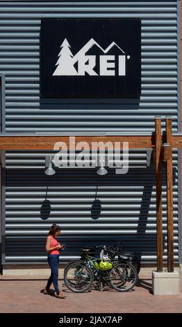 A customer exits an REI (Recreational Equipment, Inc.) store in Santa ...