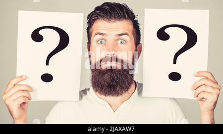 Paper notes with question marks. Beard man question mark in head ...