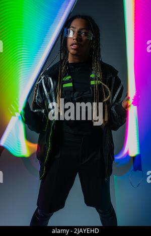 Neon metaverse futuristic concept. stylish business woman in glasses ...