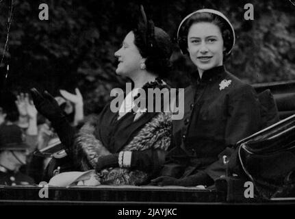 Queen Elizabeth the Queen Mother drives in her chauffeur driven buggy ...