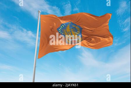 official flag of Bali Indonesia at cloudy sky background on sunset ...