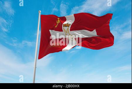 official flag of Danish Artillery Regiment , Denmark at cloudy sky ...