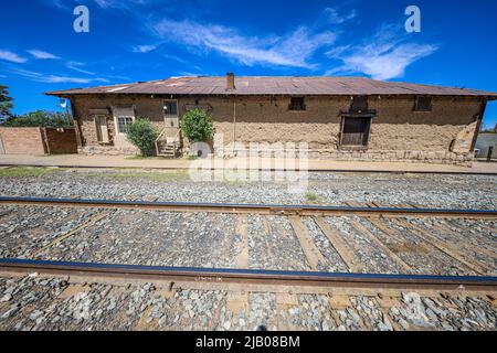 Train tracks, railway and old adobe train station in Esqueda, Mexico ...