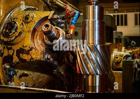 Process of cutting helical gear with modular hob cutter Stock Photo - Alamy