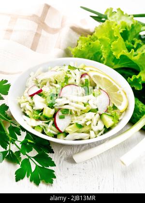 radish and green onion on light background Stock Photo - Alamy