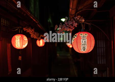 Miyagawa-cho Hanamachi (geisha district), at night. Ochaya decorated ...