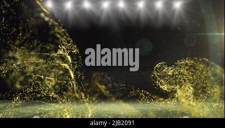 Image of golden particles moving over floodlit room Stock Photo - Alamy