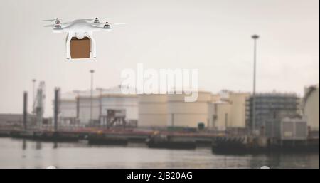 Drone carrying a box in a port Stock Photo - Alamy