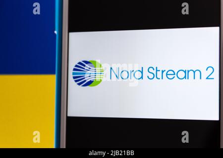 Nord Stream 2 logo on iPhone on German flag. Nord Stream is an offshore ...