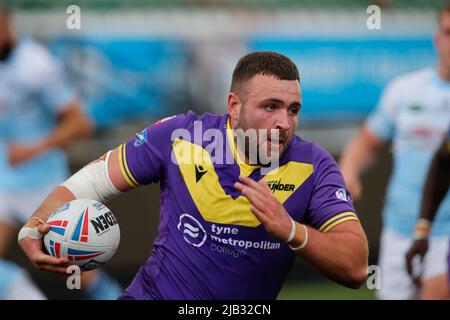 Ellis Robson of Newcastle Thunder heads for the try line during the ...