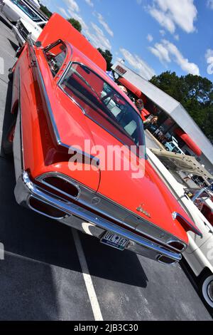 A Red 1960 Ford Starliner on display at a car show Stock Photo - Alamy
