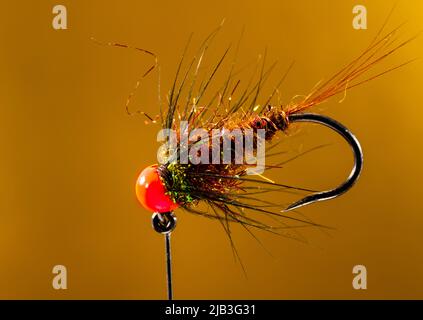 Fly for trout fishing, prepared for catching fish with barbless hook ...