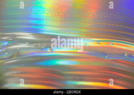 Abstract cosmetics gel on holographic background.Good as cosmetic ...