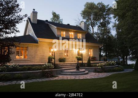 Old circa 1840 Canadiana style home with coat of grey cement applied ...