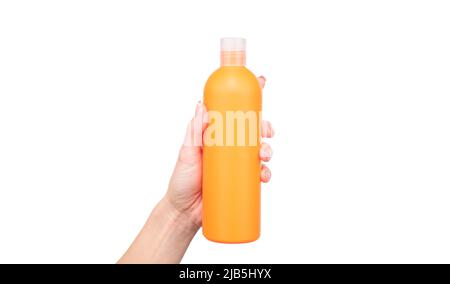 female hands hold sunblock bottle with copy space Stock Photo - Alamy