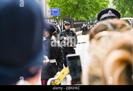 Armed police officers patrol the St Pancras International train station ...
