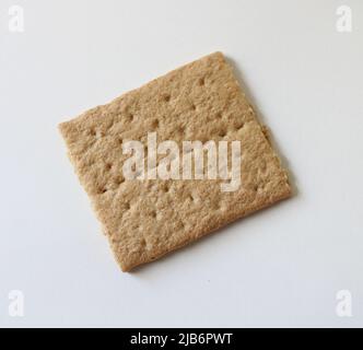 Broken square cracker isolated Stock Photo - Alamy