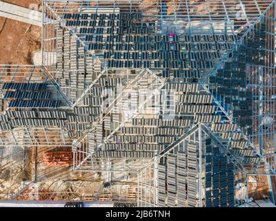 Concrete or CPAC cement roof tiles on the new roof structure. under ...
