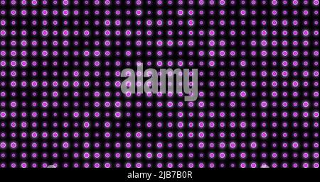 Image of changing violet dots on black background Stock Photo - Alamy