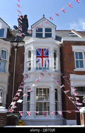 the personal flag of Queen Elizabeth II flying in the wind. Tradition ...