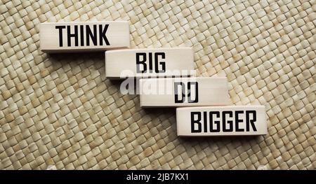 Think big is written on the wooden surface. Wooden Concept Stock Photo ...