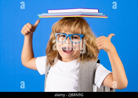 Excited schoolchildren in uniform, on a school trip, viewing ...