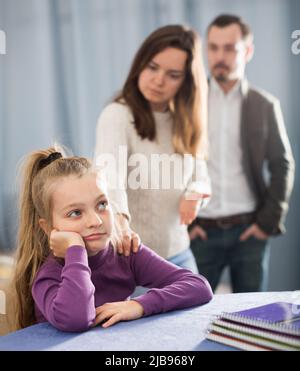 Parents lecturing daughter Stock Photo - Alamy