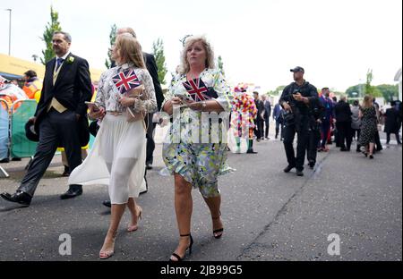 Racegoers arrive for day two of the Cazoo Derby Festival at Epsom ...