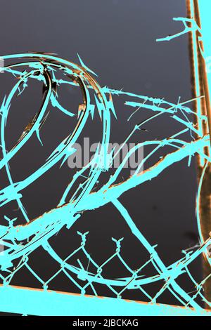 Barbed wire fence protecting something important Stock Photo - Alamy