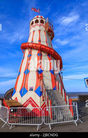 The fun fair at Hunstanton on the north coast of Norfolk on a clear ...