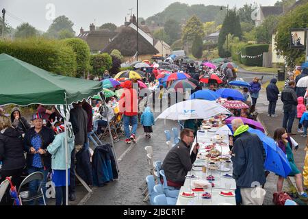 Tolpuddle, Dorset, UK. 5th June 2022. UK Weather: Residents brave the ...