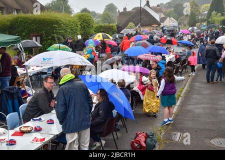 Tolpuddle, Dorset, UK. 5th June 2022. UK Weather: Residents brave the ...