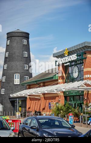 Timms Mill Grade II Listed disused windmill and Morrisons supermarket ...