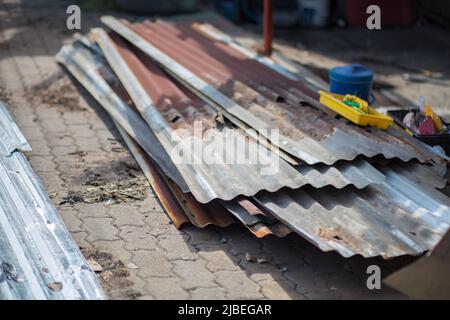 Old zinc, stacked to the ground Stock Photo - Alamy