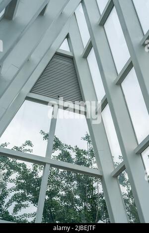 A beautiful glass triangular steeple church Stock Photo - Alamy