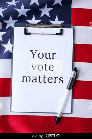 Composition of American flag and election voting silhouette. Describe ...