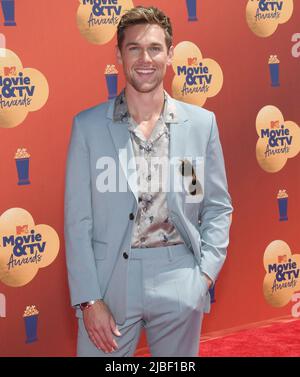 Taylor John Smith arrives at the MTV Movie and TV Awards on Sunday ...