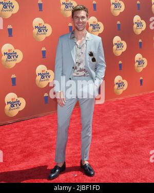 Taylor John Smith arrives at the MTV Movie and TV Awards on Sunday ...