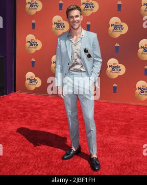 Taylor John Smith arrives at the MTV Movie and TV Awards on Sunday ...