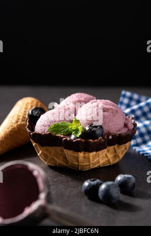 Ice cream with blueberry in a waffle cup Stock Photo - Alamy