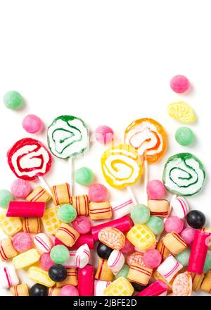 Pastel colored sweets isolated on white background Stock Photo - Alamy