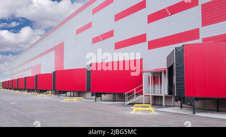 Entrance ramps of a large distribution warehouse with gates for loading ...