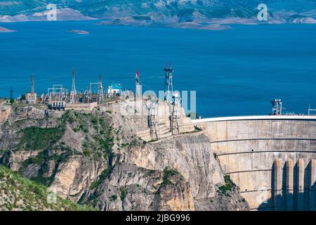 upper part of huge arch dam of the hydroelectric power station and the ...