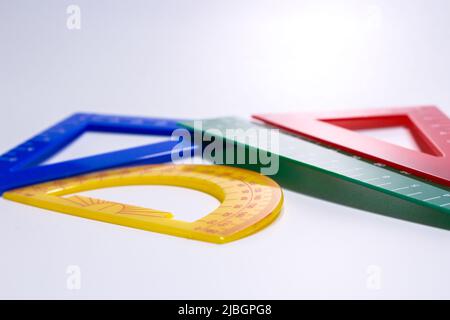Concept image of colourful rulers and protractor in white background ...
