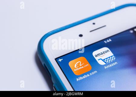 Amazon & Alibaba, 2 big tech giants, on an iPhone. Alibaba is Chinese ...